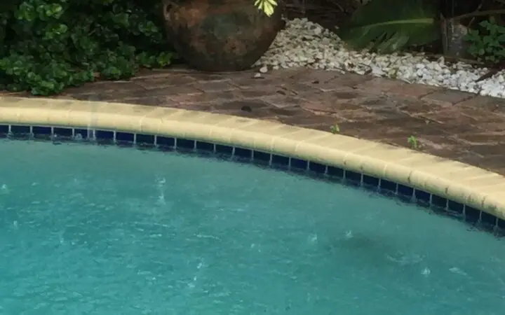 What Effect Does Rain Have on The Water in My Swimming Pool?